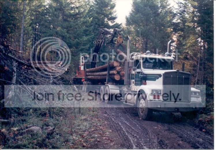 Hydraulic Excavators turned into Log Loader, then put on Rubber Tire SP ...